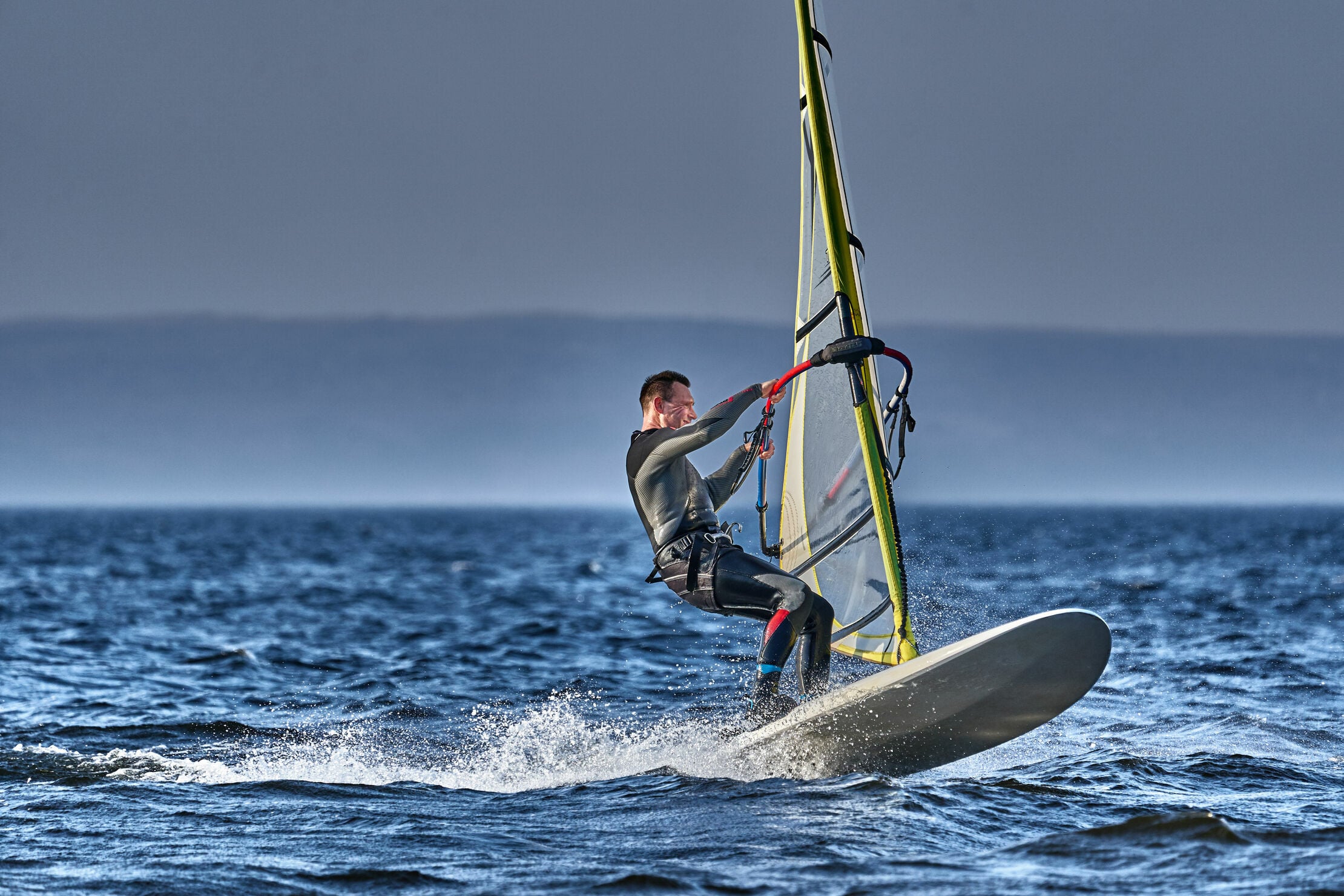 Paddleboard with a sail: How to windsurf on a SUP [Instructions] - Muziker